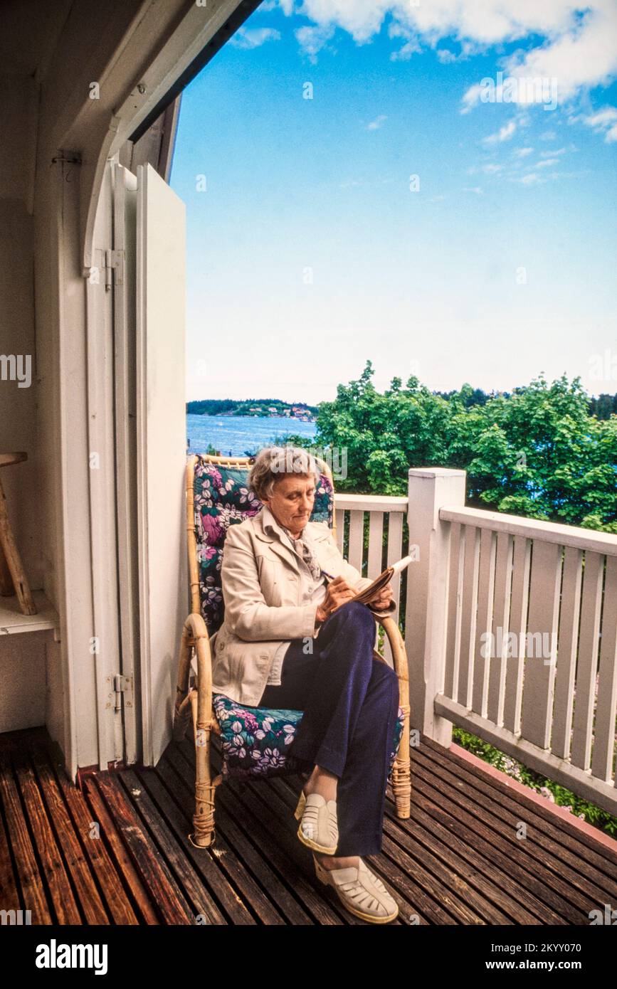 Astrid Lindgren, children's book author on the balcony of her summer ...