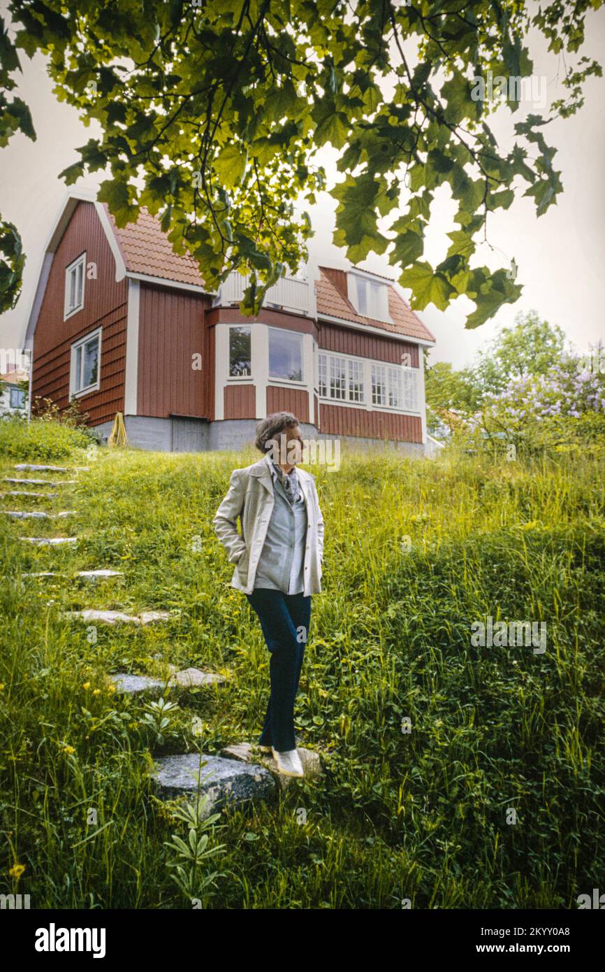 Astrid Lindgren, children's author outside her summer house in Furusund ...