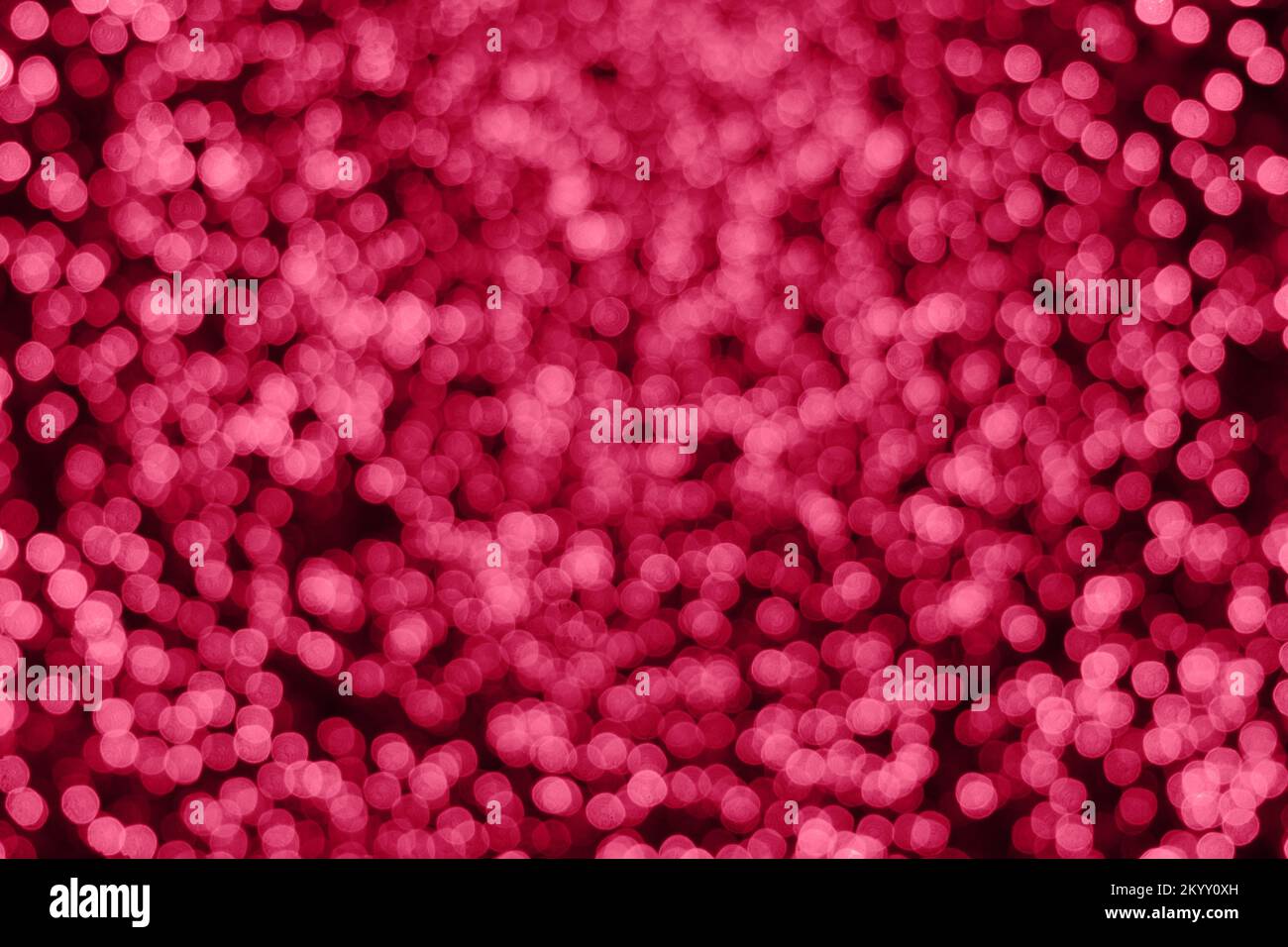 Festive abstract background with blurred lights of vivid pink color ...