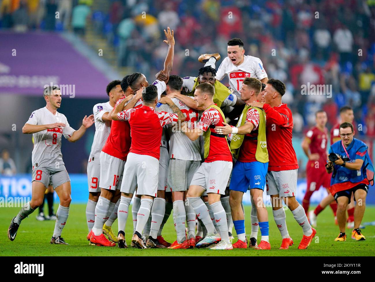 Switzerland players celebrate at the end of the FIFA World Cup Group G ...