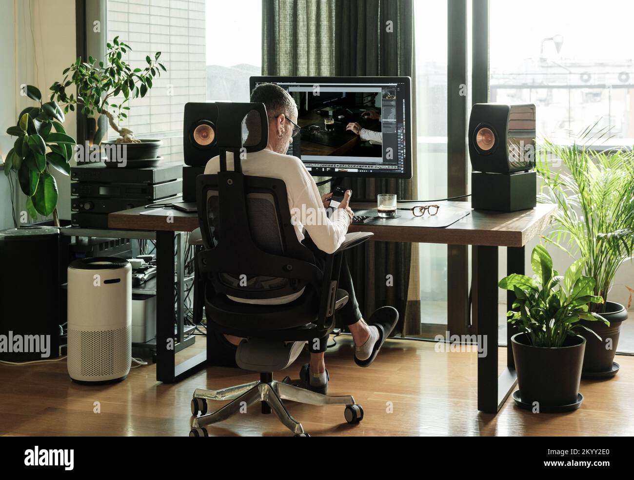 Graphic designer working from home Stock Photo - Alamy