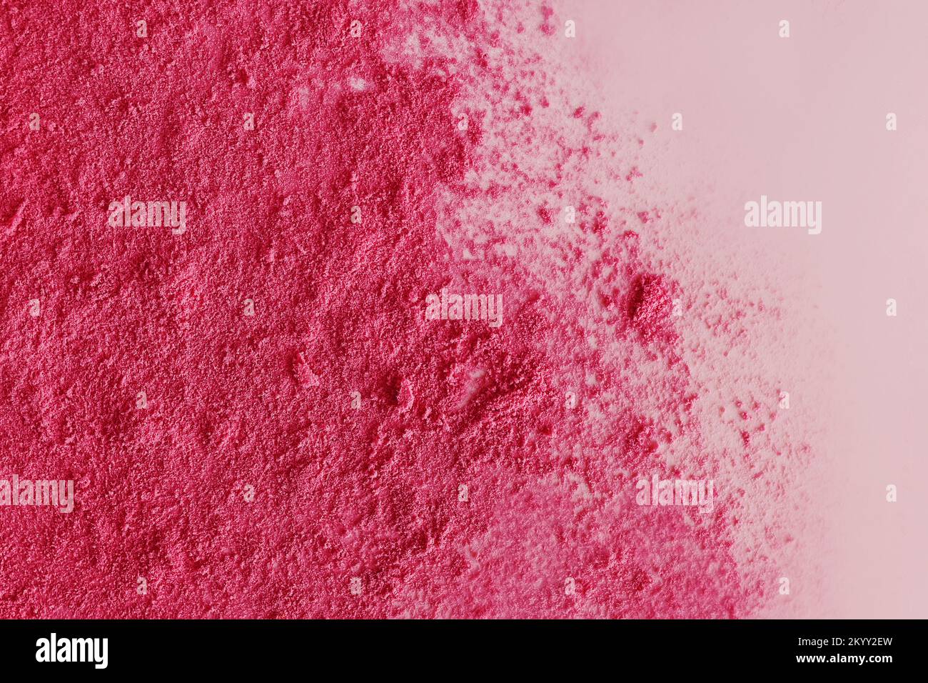 Magenta powder on pink background, close-up, abstract background Stock ...
