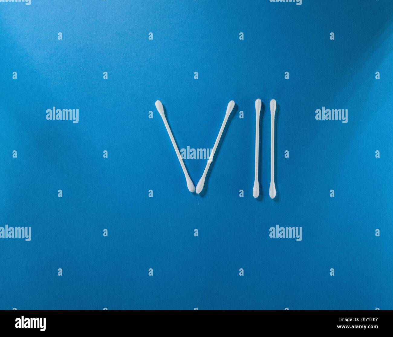 number seven (7) in roman numerals with clean white cotton buds ...