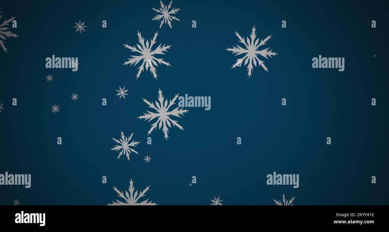Composite of christmas snow falling over blue background Stock Photo ...