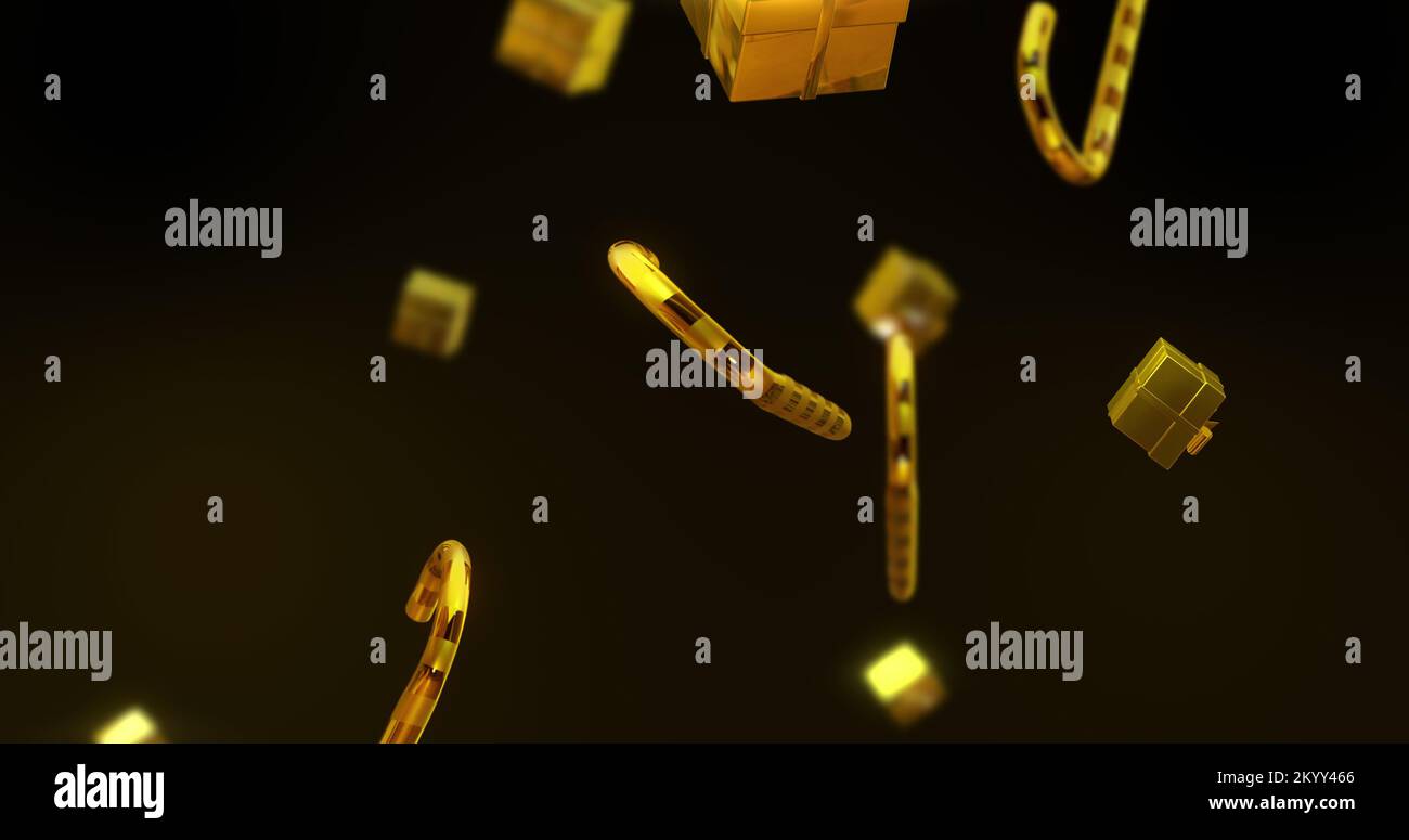 Image of gold presents and candy canes falling over black background ...