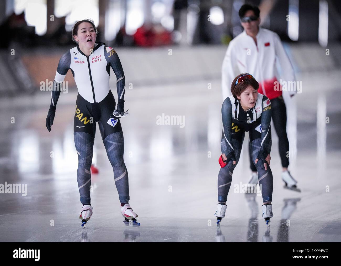 Konami Soga of Japan her teammate Yukino Yoshida catch their breath ...
