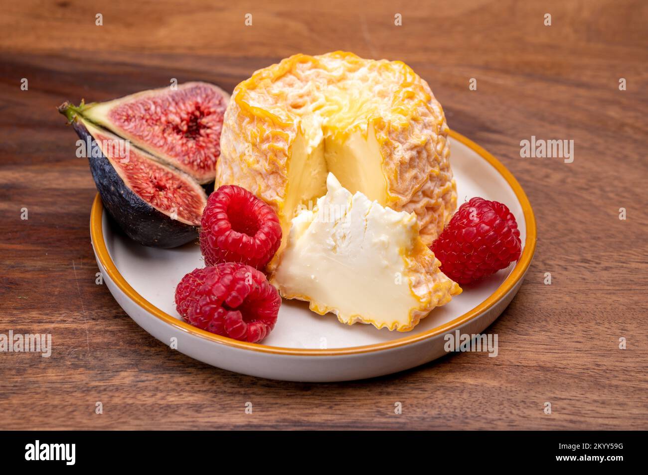 French Langres soft cows crumbly cheese with washed rind structure made ...