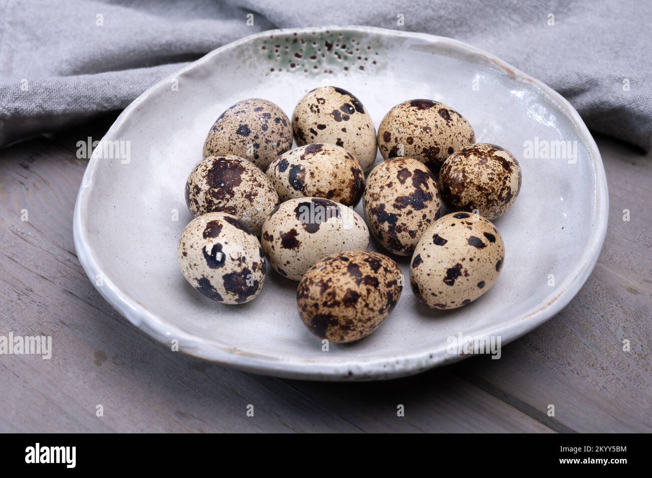Fresh small spotted partridge or quail bird eggs uncooked Stock Photo ...