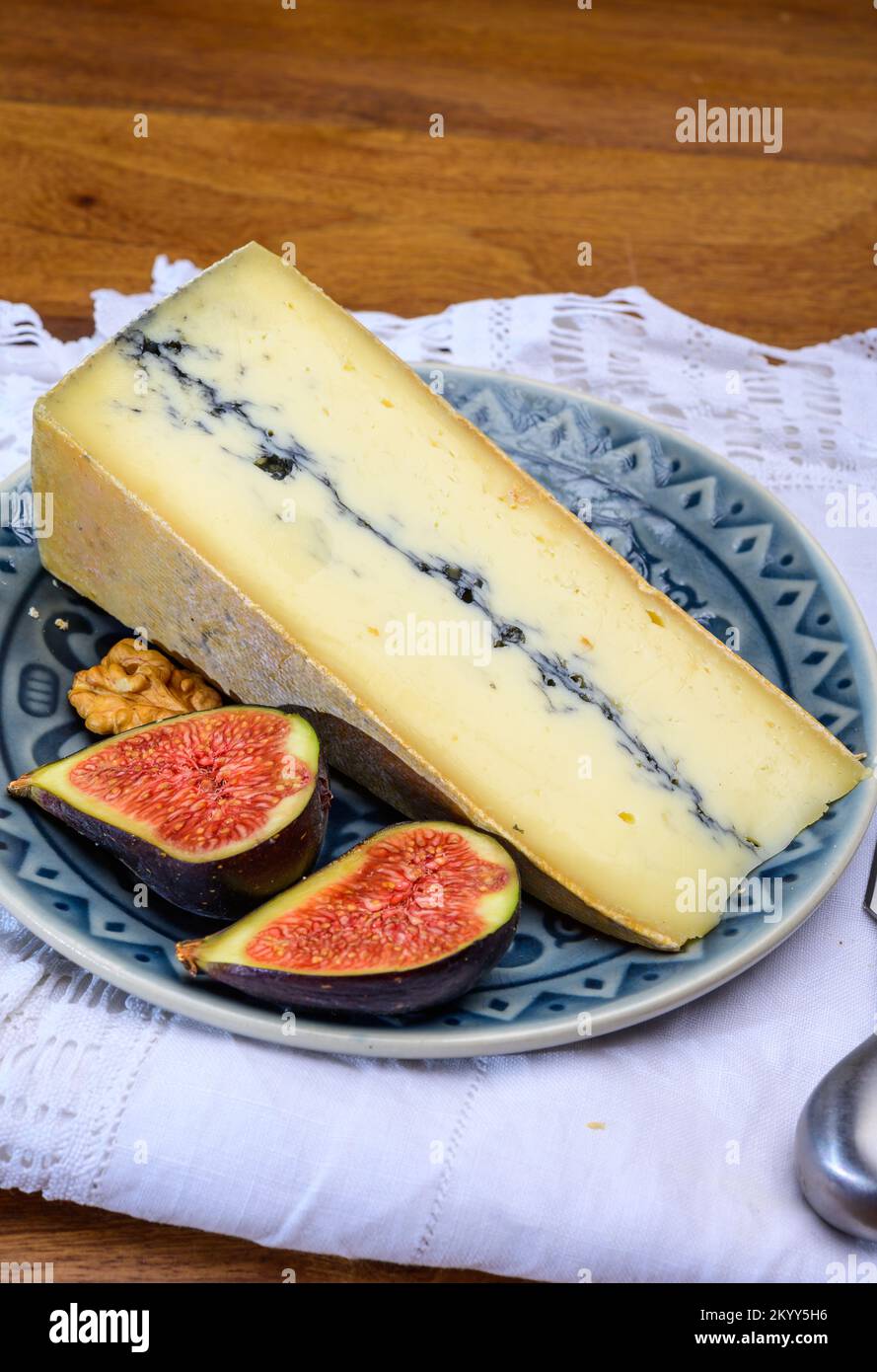 French semi-soft cow milk cheese morbier from Franche-Comte region with ...