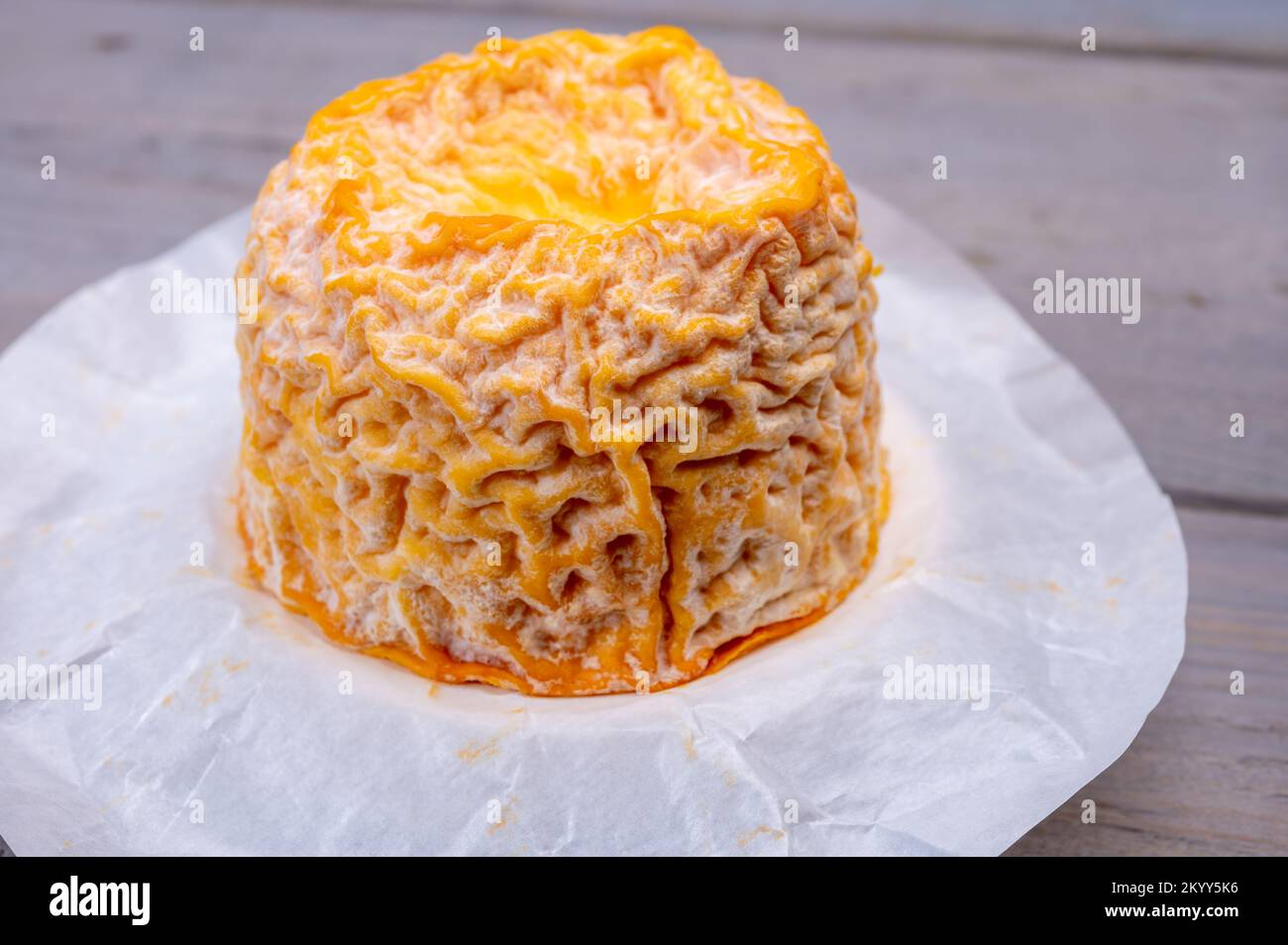 French Langres soft cows crumbly cheese with washed rind structure made ...