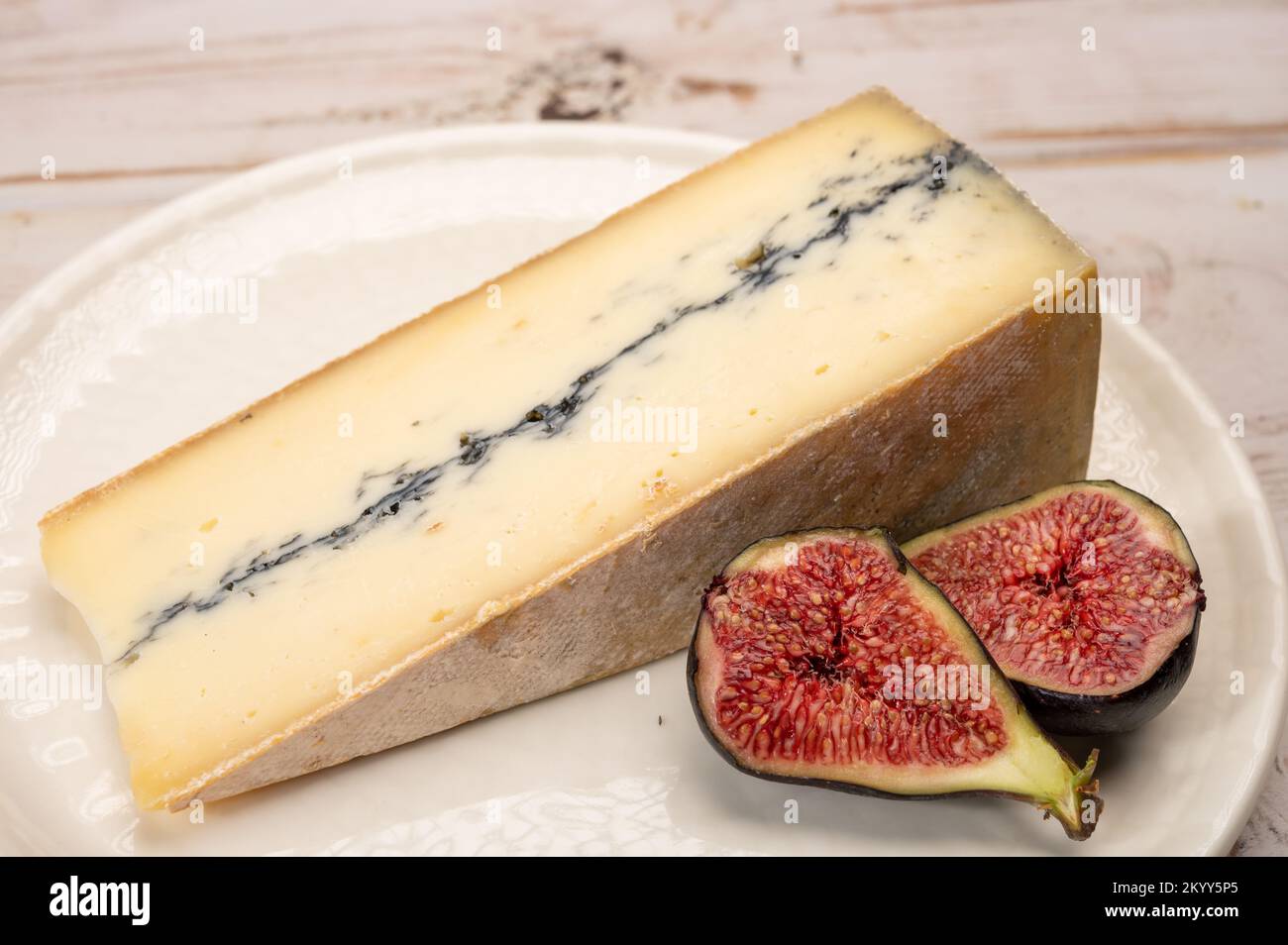 French semi-soft cow milk cheese morbier from Franche-Comte region with ...