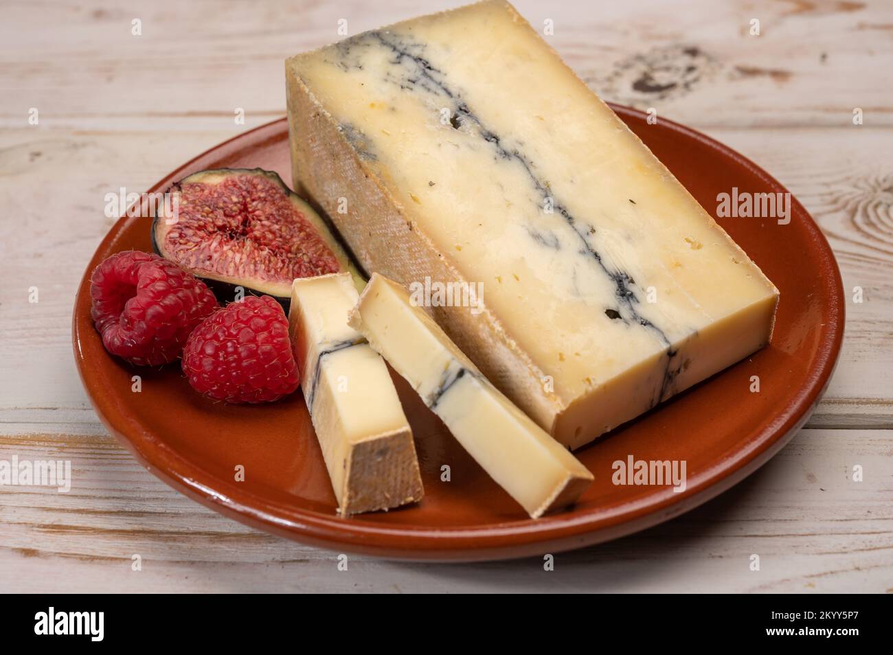 French semi-soft cow milk cheese morbier from Franche-Comte region with ...