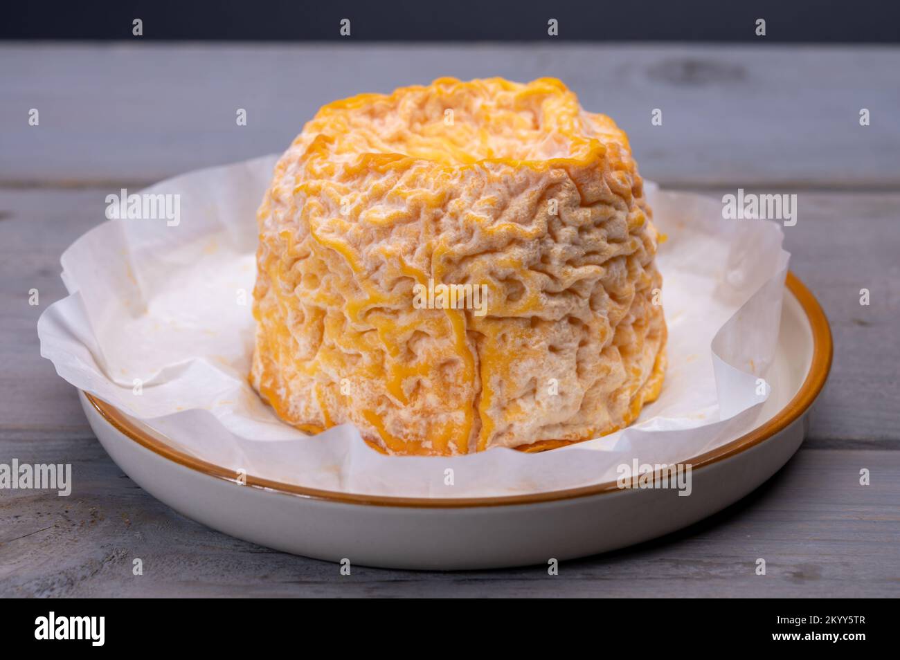 French Langres soft cows crumbly cheese with washed rind structure made ...