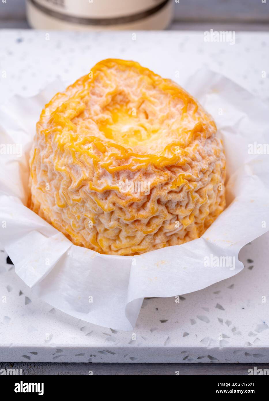 French Langres soft cows crumbly cheese with washed rind structure made ...