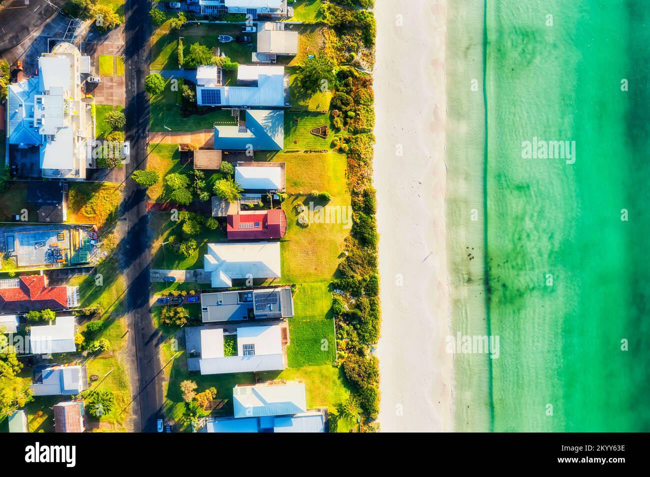 Aerial top down view over waterfront of Callala beach resort town on ...