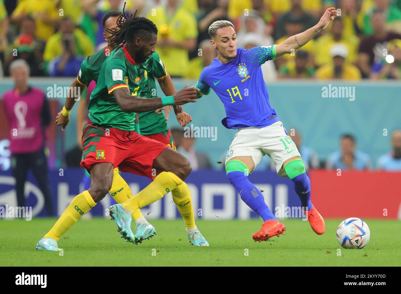 Lusail, Qatar. 02nd Dec, 2022. Anthony of Brazil is challenged by Andre ...