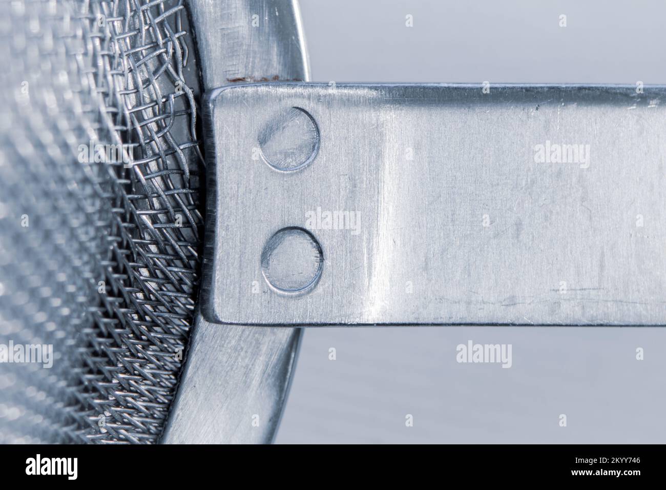Close up of rivets on metal sieve Stock Photo - Alamy