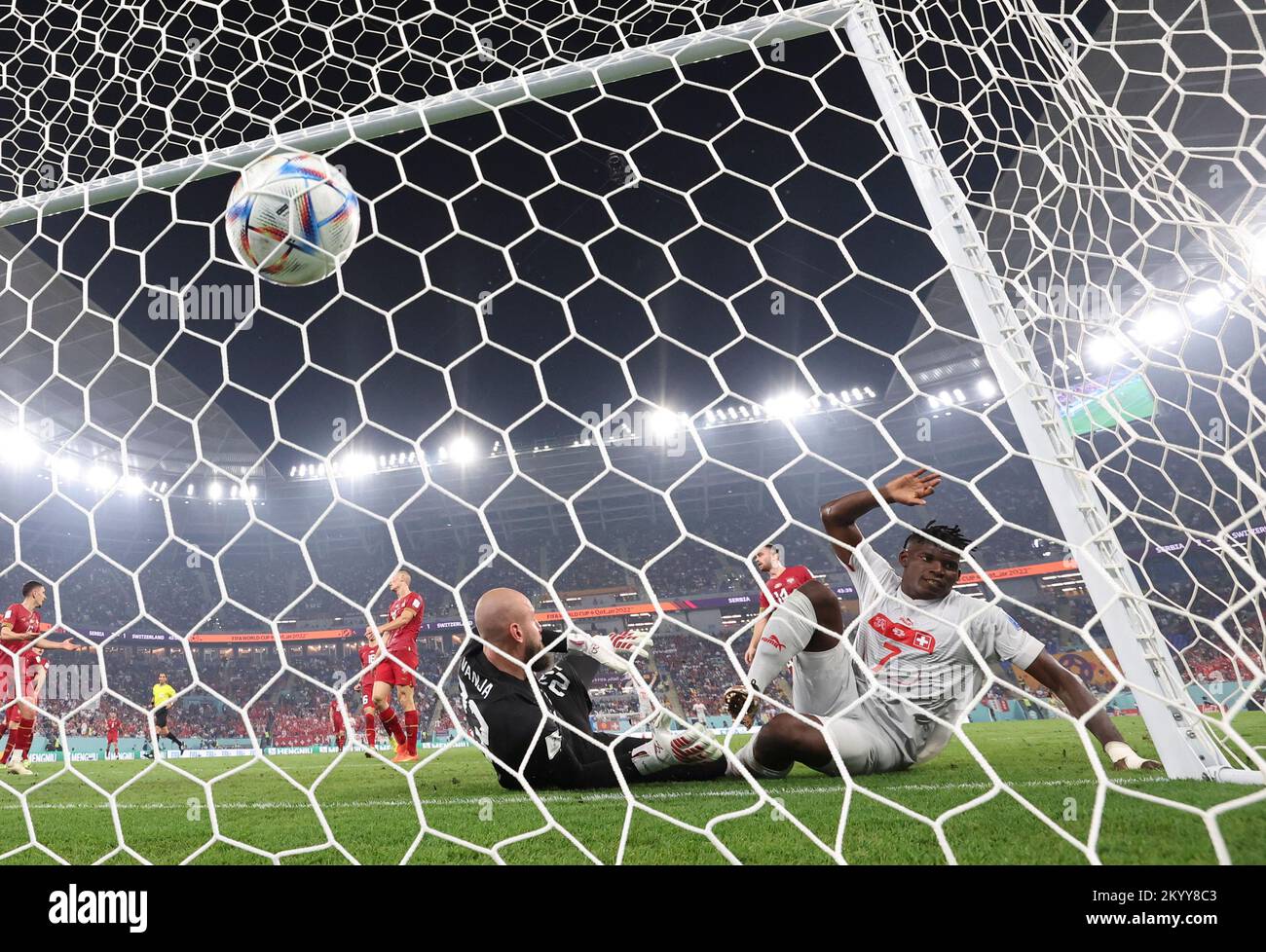 Doha, Qatar. 2nd Dec, 2022. Breel Embolo (1st R) of Switzerland scores ...