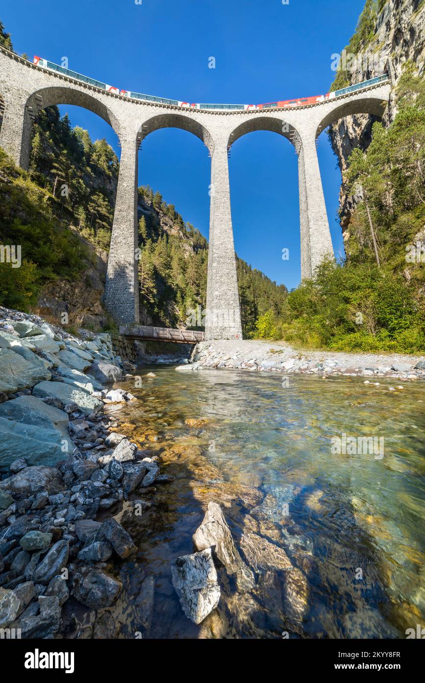 Swiss train over Landwasser Viaduct bridge in the alps, Graubunden ...
