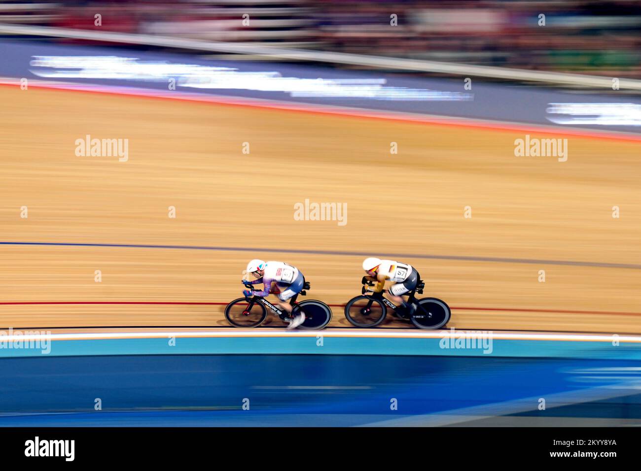 William Perrett, (left) on the way to winning the mens scratch race ...