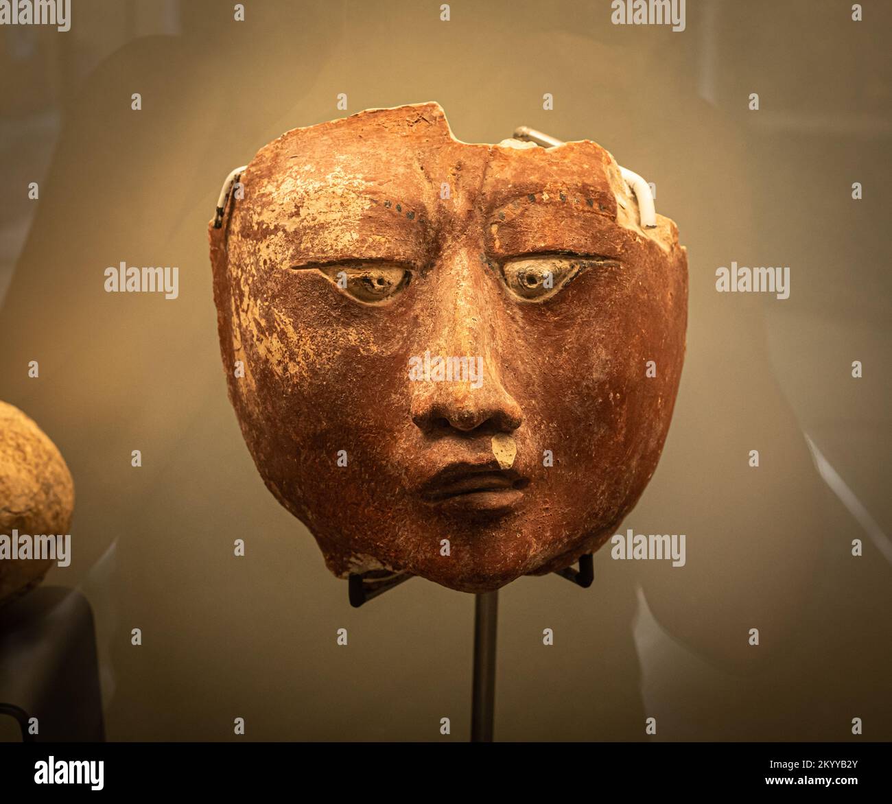 Stucco mask depicting a crossed eyed maya. Late classic period ...