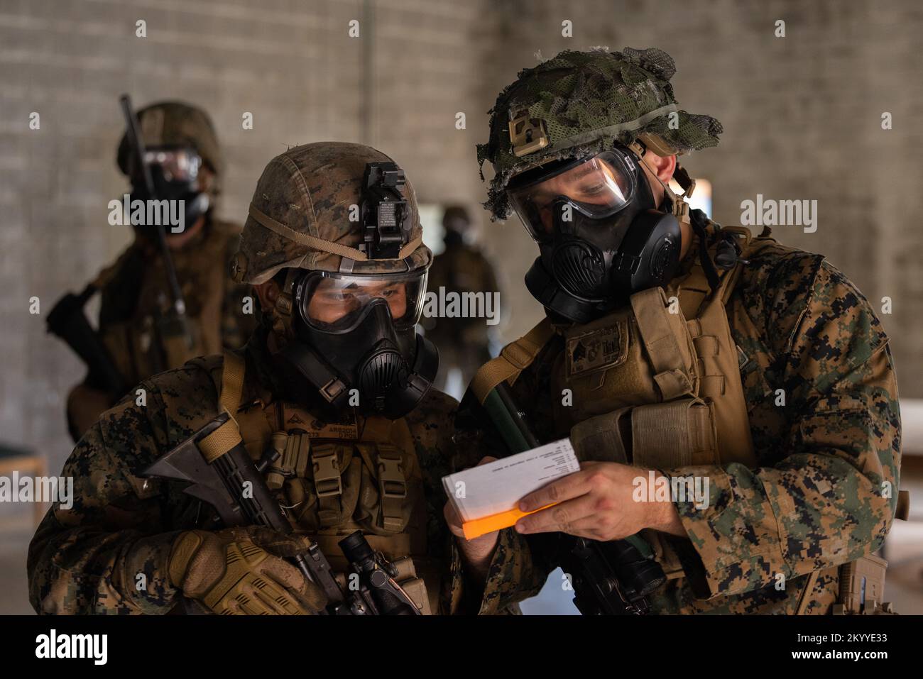 U.S. Marine Corps Sgt. Thomas Ward, right, combat engineer, Marine Wing ...