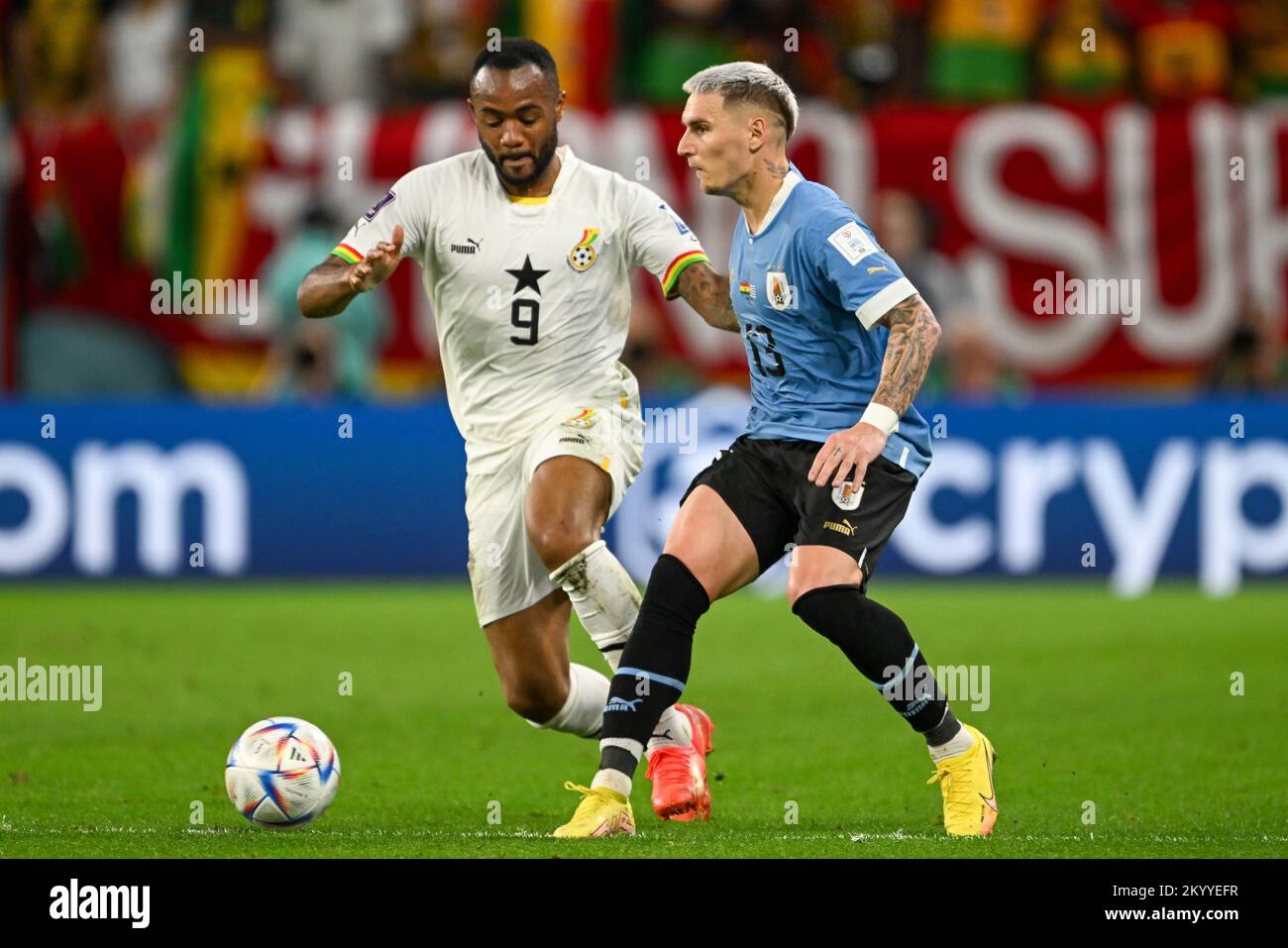 Jordan Ayew of Ghana and Guillermo Varela of Uruguay during the FIFA ...