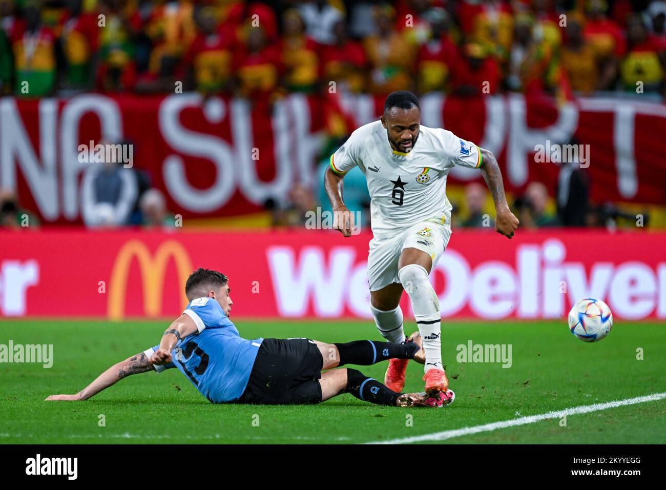 Jordan Ayew of Ghana and Guillermo Varela of Uruguay during the FIFA ...