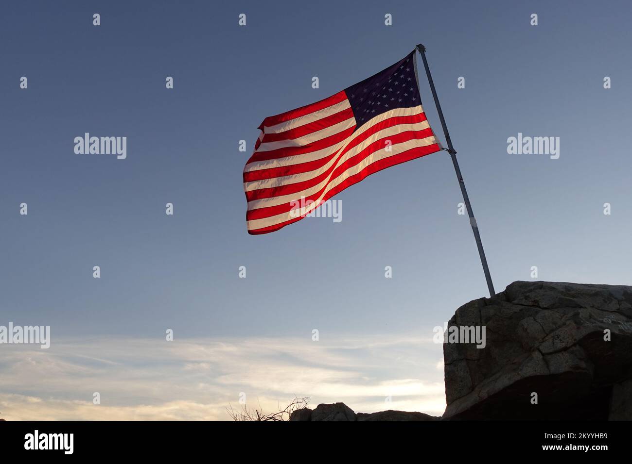 Beautiful golden sunset flag flying hi-res stock photography and images ...