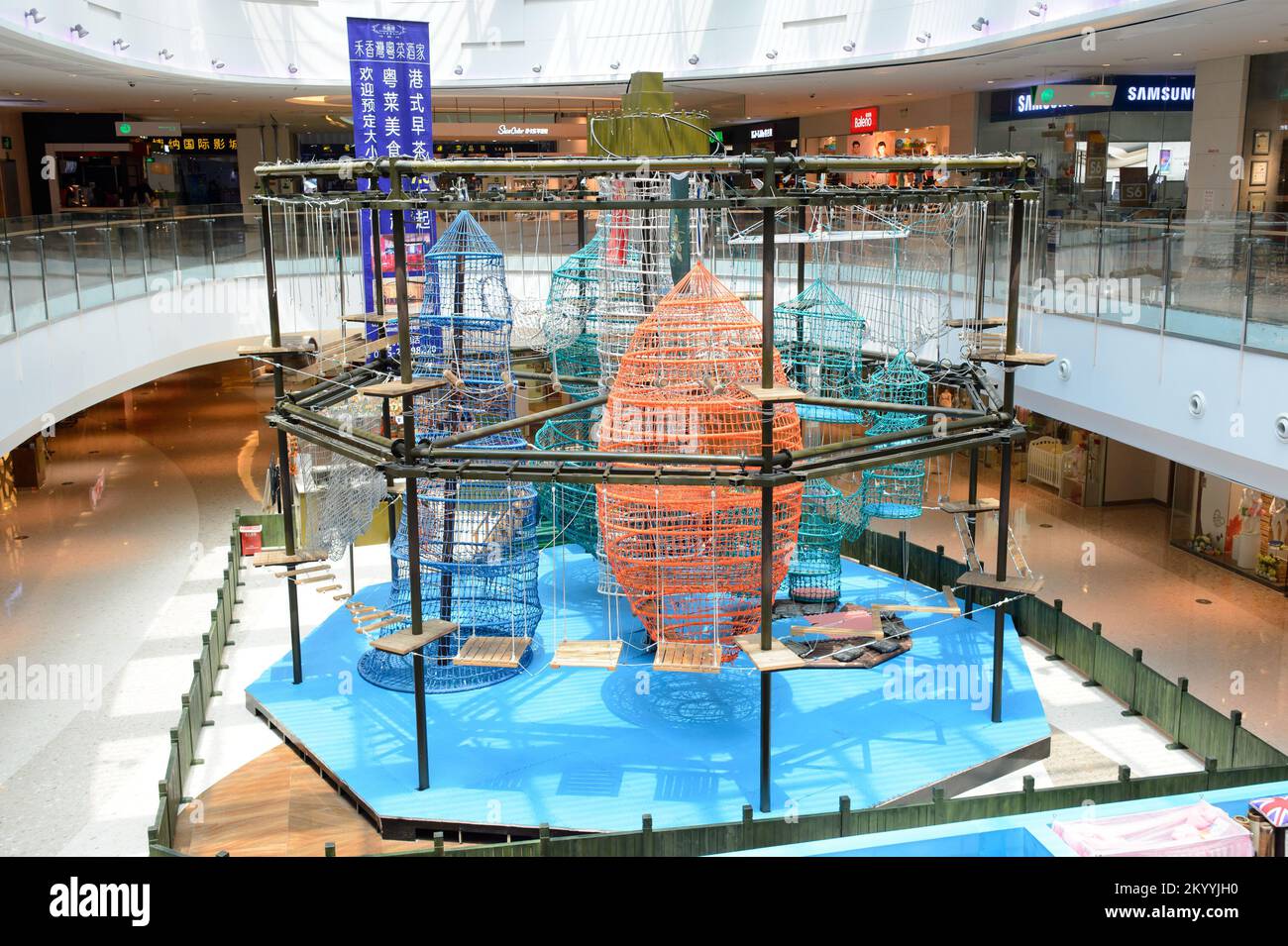 SHENZHEN, CHINA - MAY 25, 2015: interior of COCO Park shopping center ...