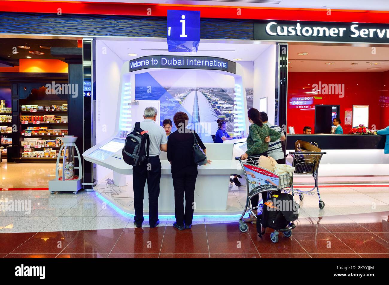 DUBAI, UAE - SEPTEMBER 08, 2015: information desk in Dubai Airport ...