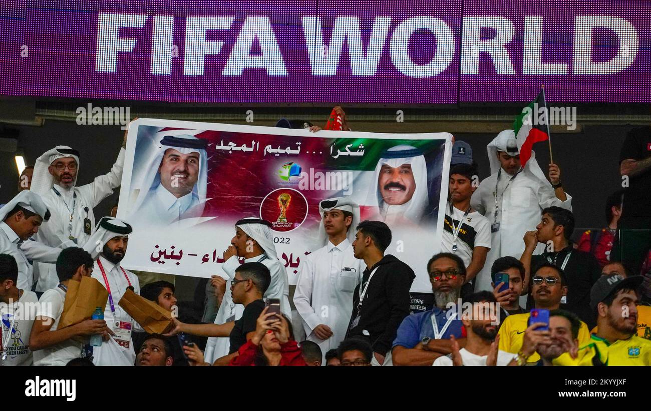 Doha, Qatar. 02nd Dec, 2022. Banner with of Qatar’s Emir Tamim bin ...