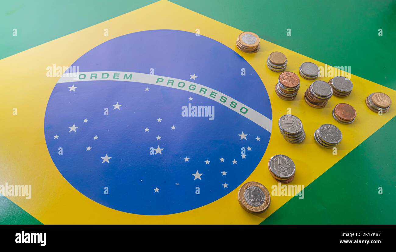 Translation "order progress"Brazilian flag with Brazilian real coins ...