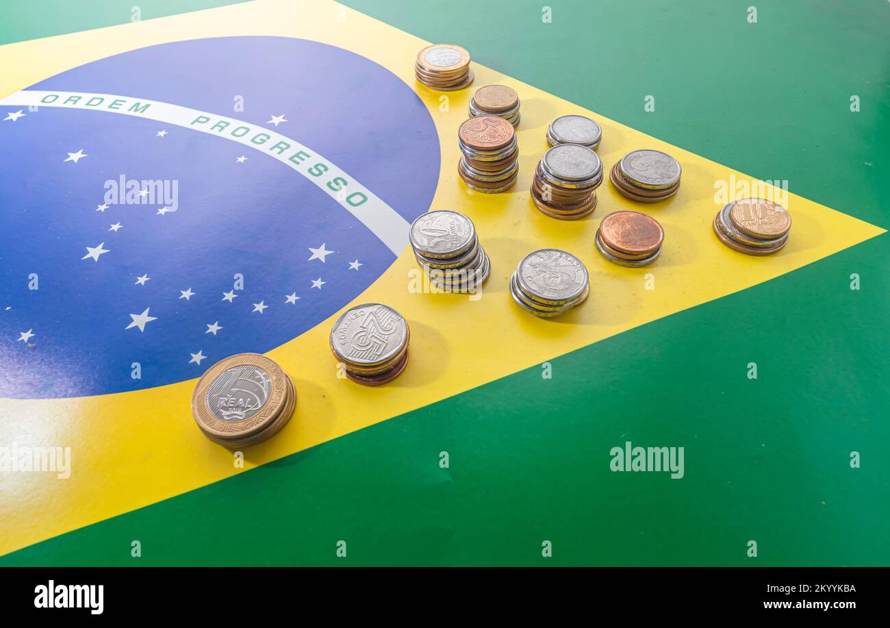 Translation "order progress"Brazilian flag with Brazilian real coins ...