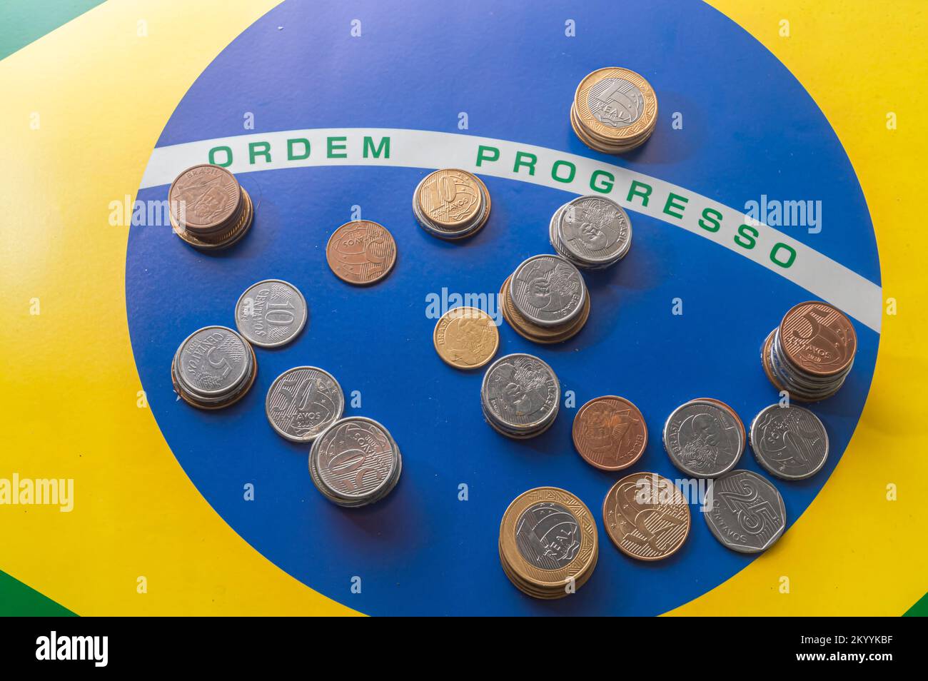 Translation "order progress"Brazilian flag with Brazilian real coins ...