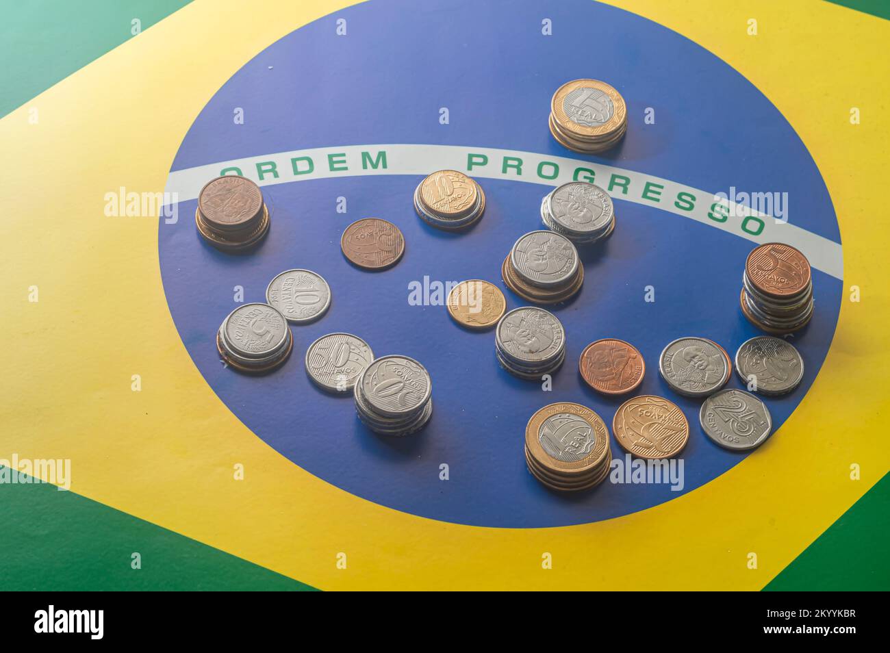 Translation "order progress"Brazilian flag with Brazilian real coins ...
