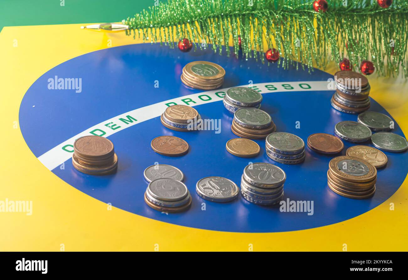 Translation "order progress"Brazilian flag with Brazilian real coins ...