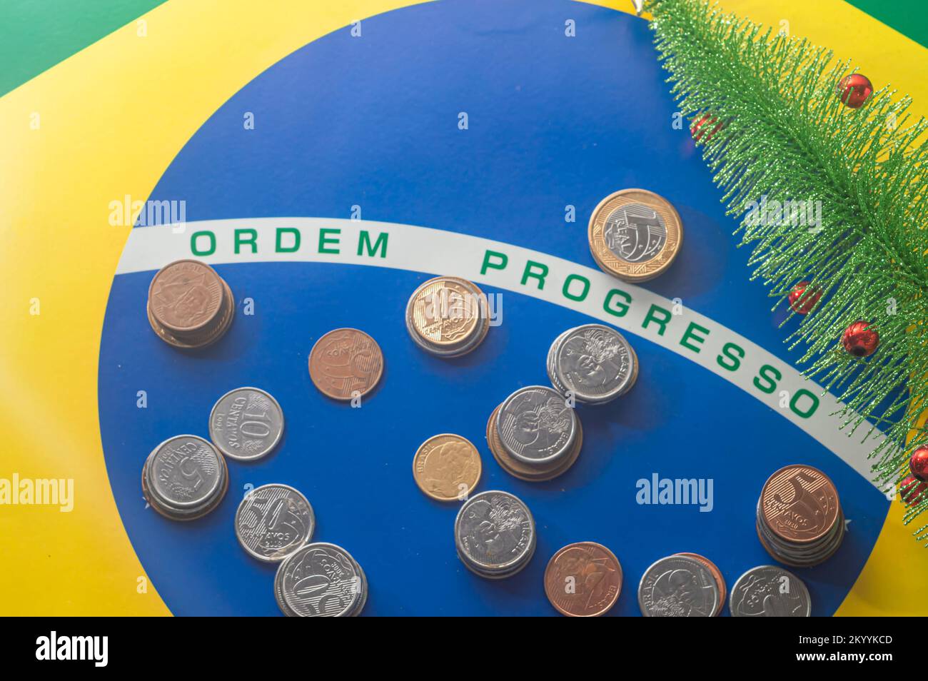 Translation "order progress"Brazilian flag with Brazilian real coins ...