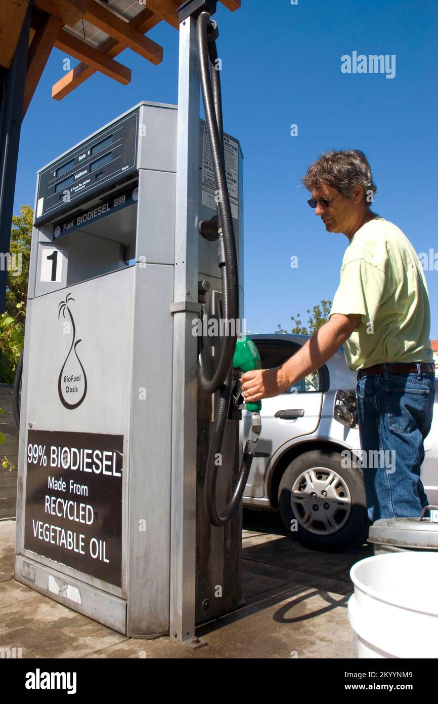 Man filling tank at Biofuel Oasis, biodiesel station in Berkeley, CA ...