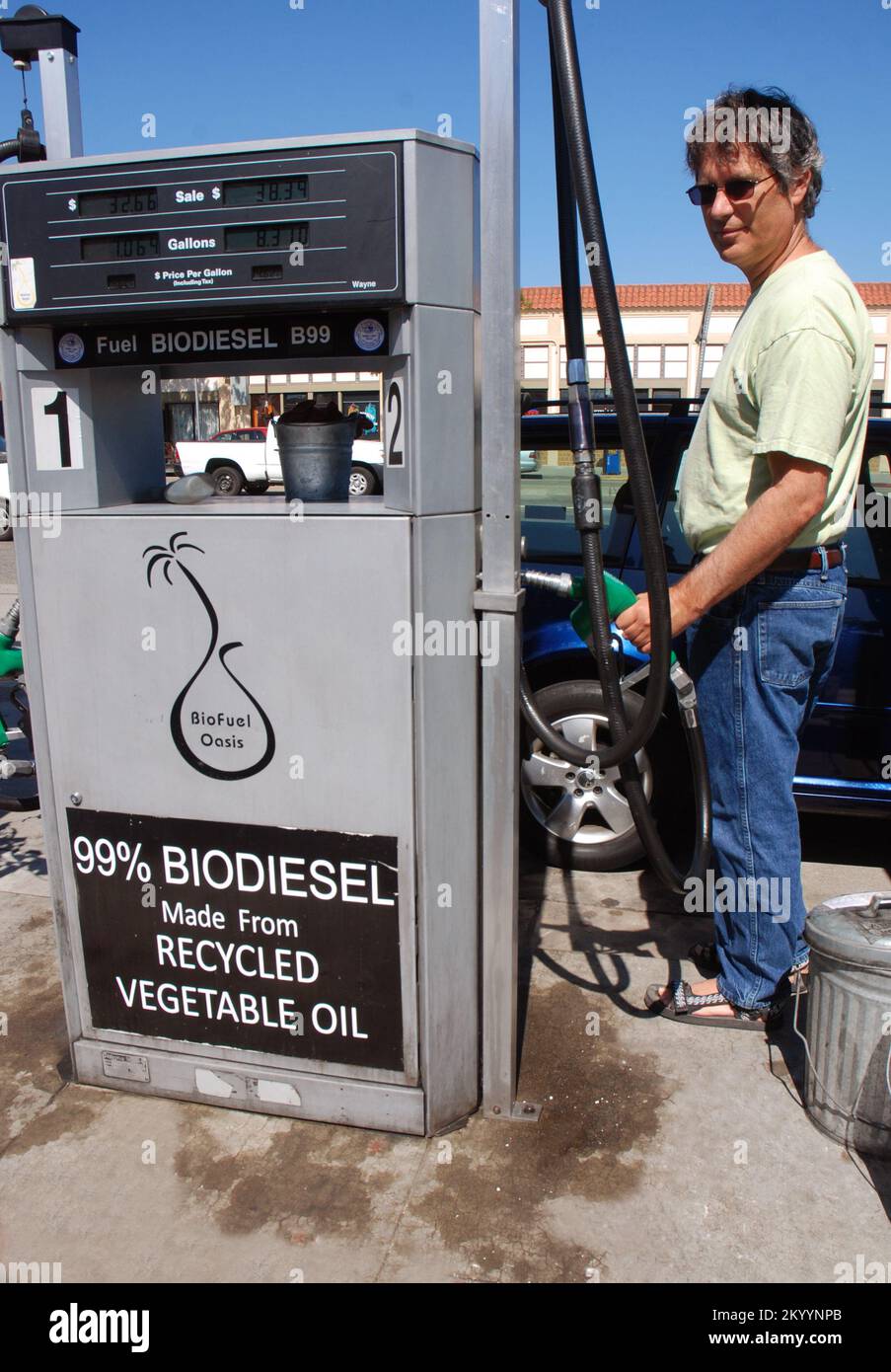 Man filling tank at Biofuel Oasis, biodiesel station in Berkeley, CA ...