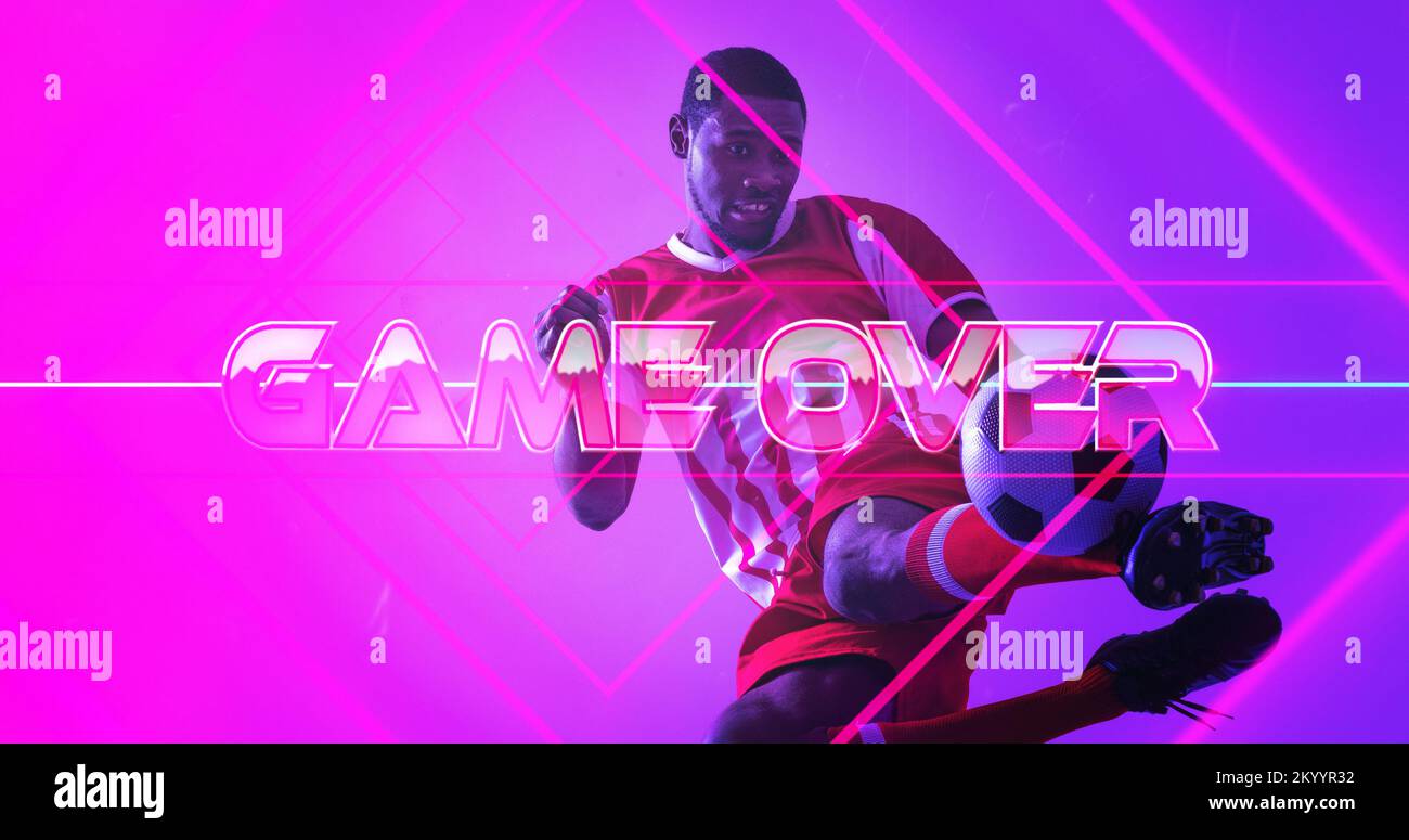 African american player jumping and kicking soccer ball over ...