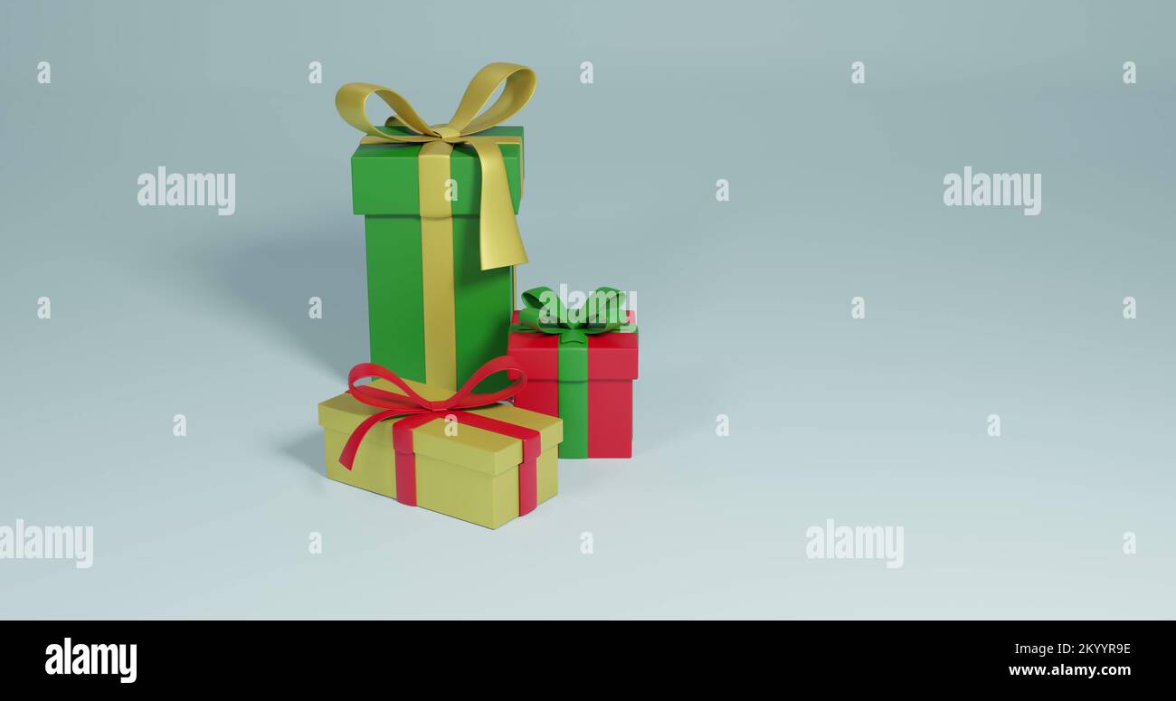 Image of three christmas presents spinning with copy space over grey ...