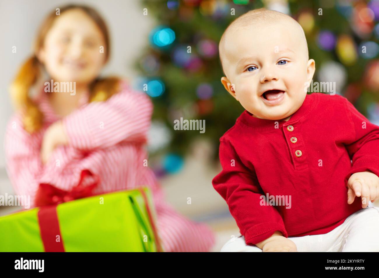 Making happy Christmas memories - Babys first Christmas. Cute little ...
