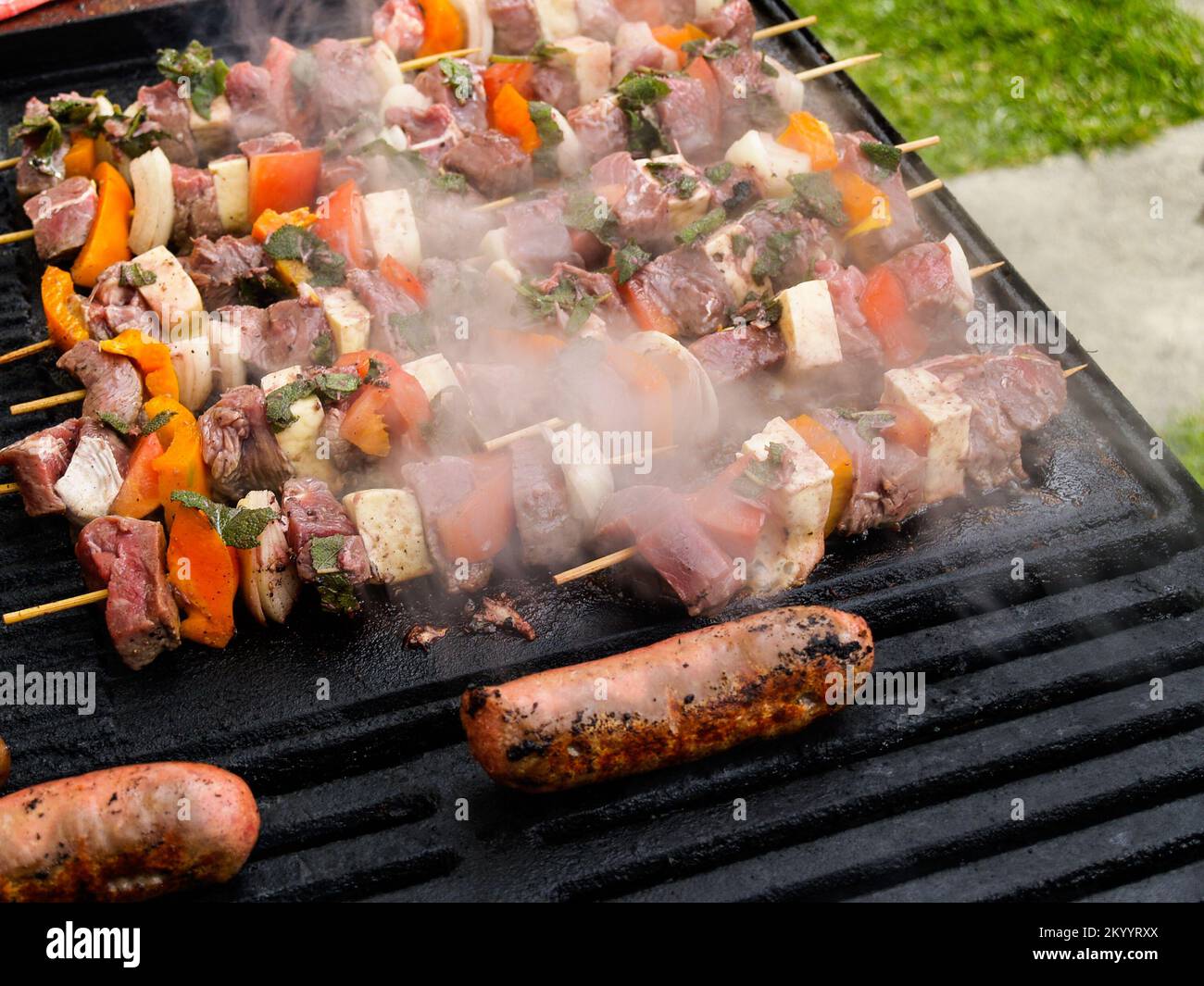 Outdoor cooking on barbeque in summer Stock Photo - Alamy