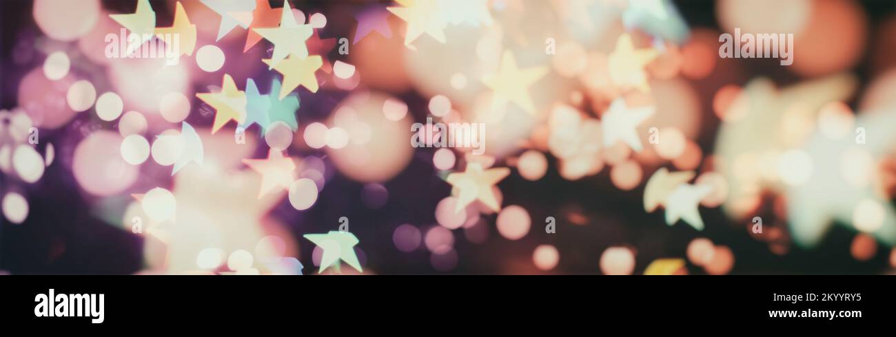 Abstract light celebration background with defocused golden lights for ...