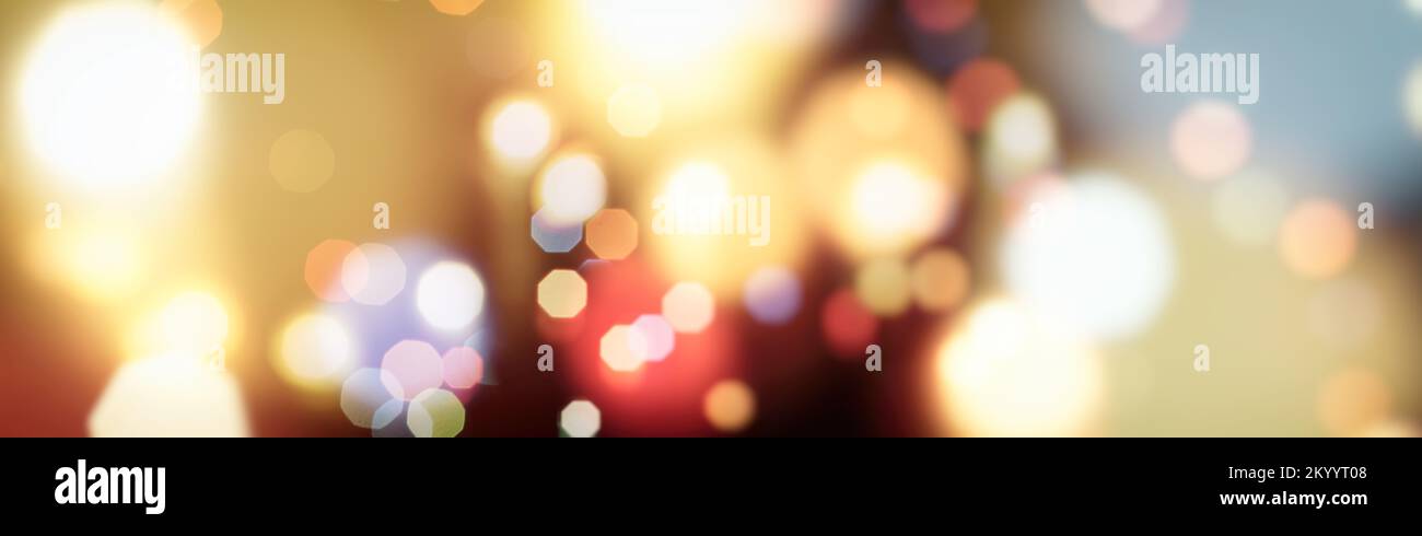 Abstract light celebration background with defocused golden lights for ...