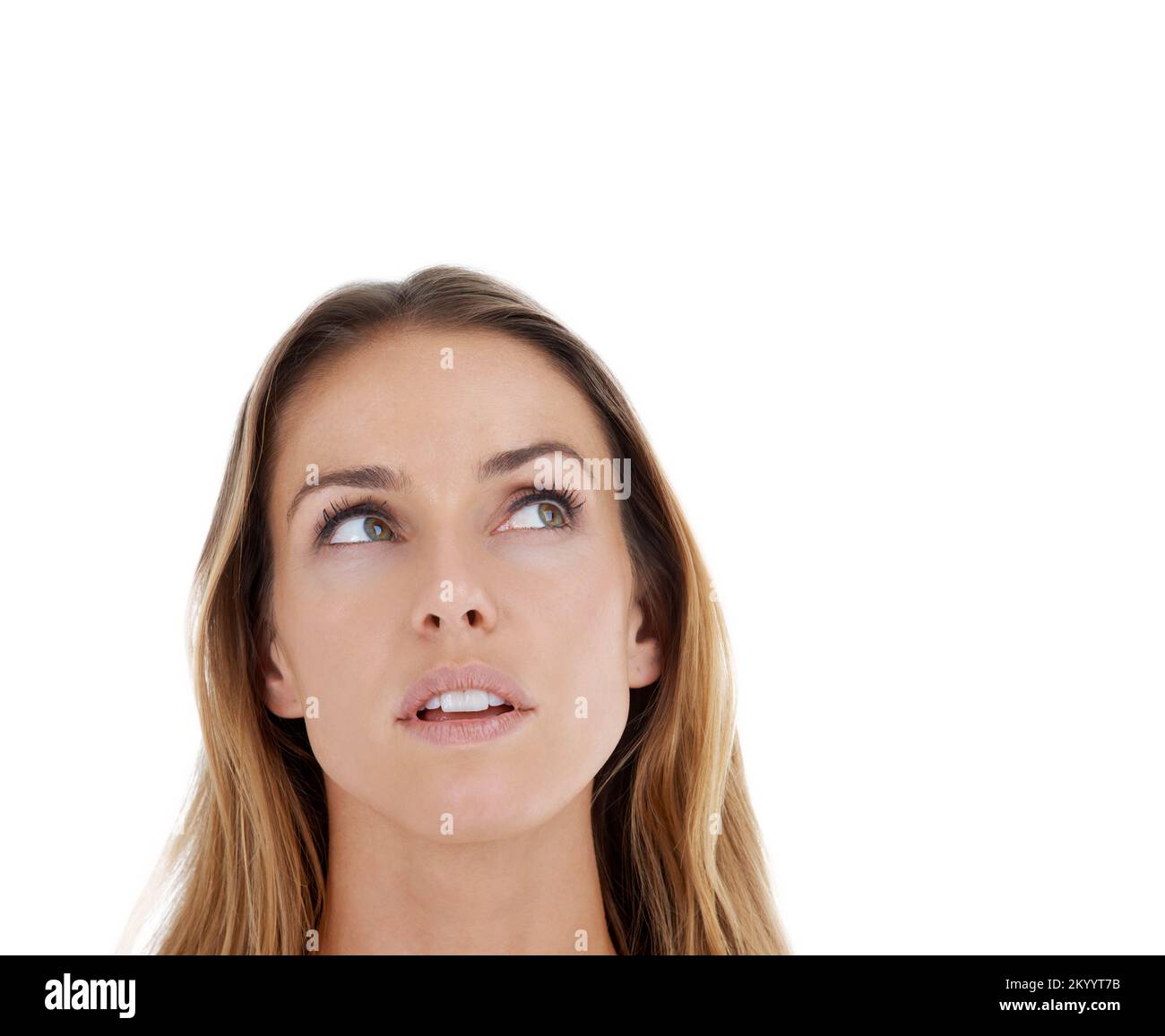 Thinking of what the future holds....Studio headshot of a young woman ...