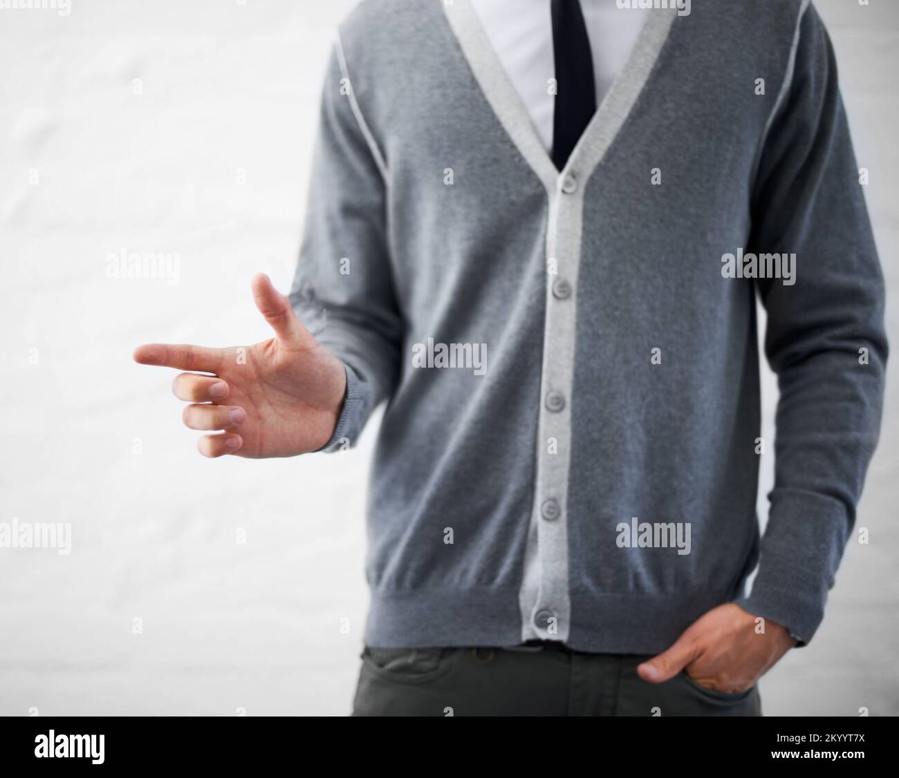 Ready to hold your product. Cropped image of a young nerdy guy holding ...