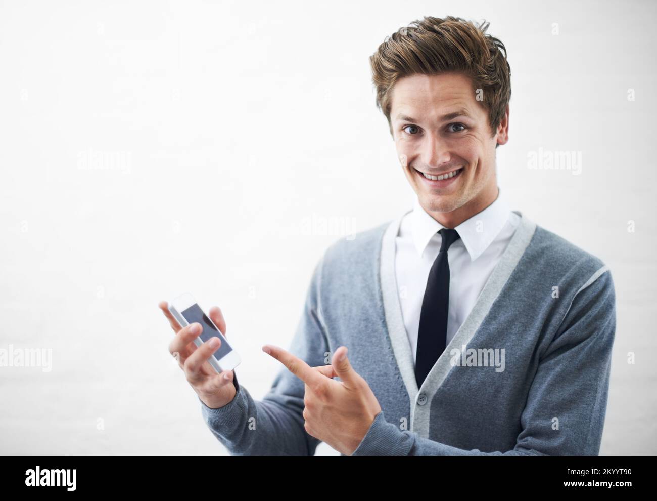 Check out this amazing technology. A young nerd presenting a smartphone ...