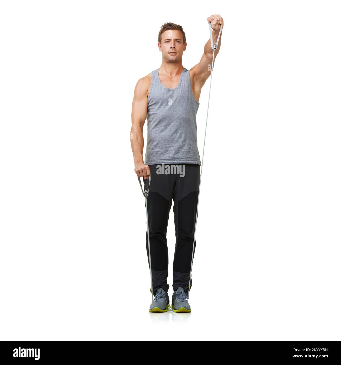Showing you how its done. A fit young man working out with a resistance ...